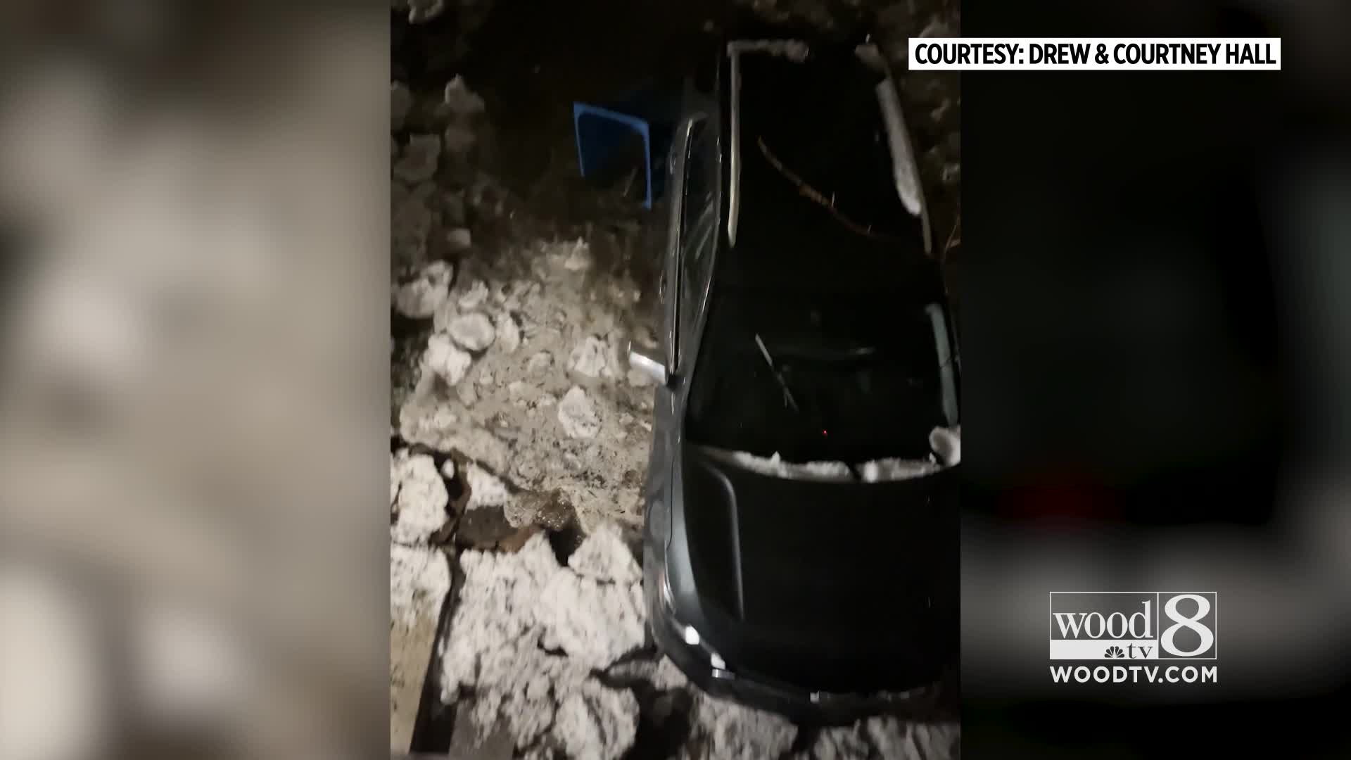 Flooding and hail along Carrier Creek in Grand Rapids during severe ...