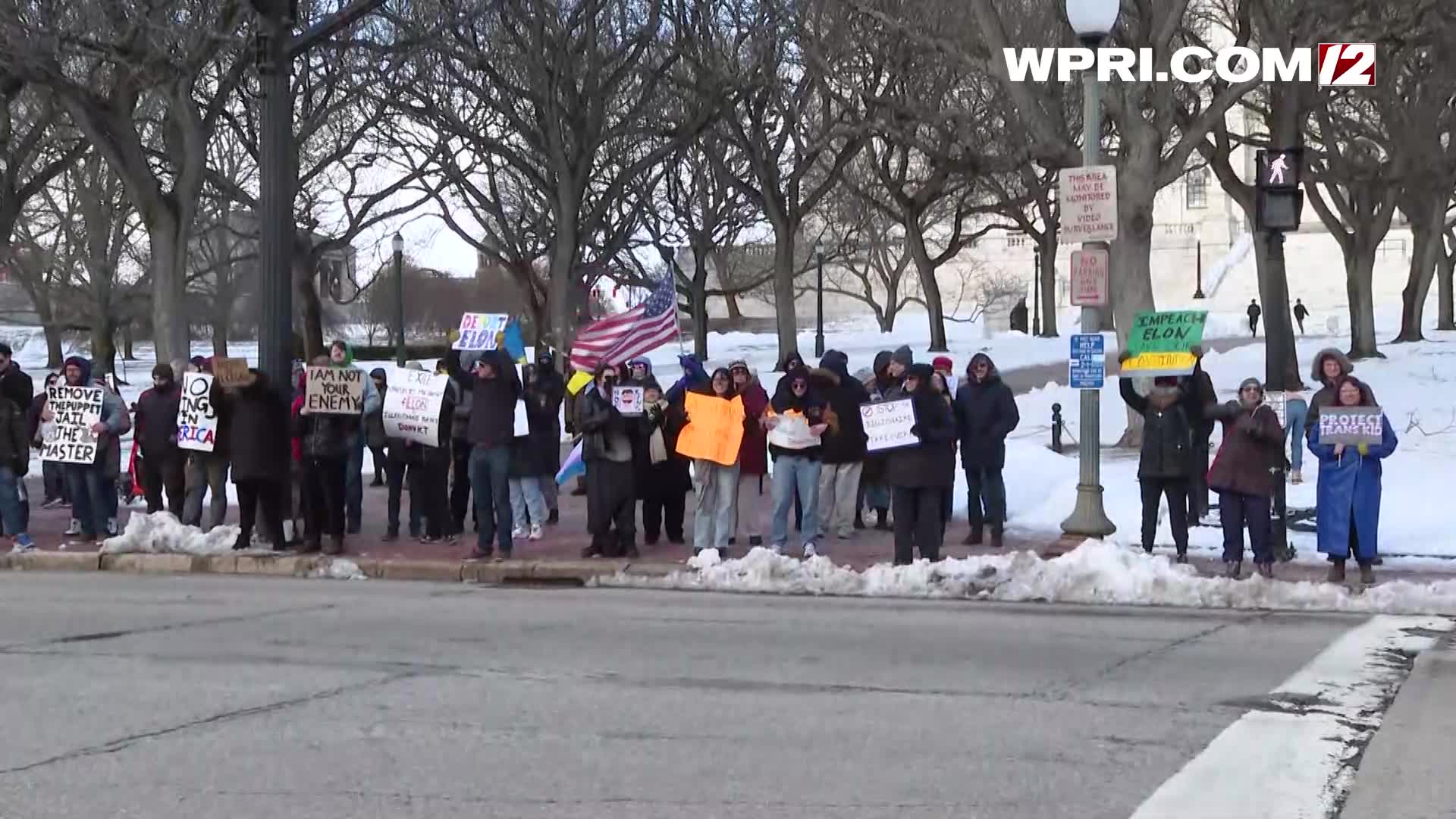 VIDEO NOW: RI State House protest against Trump, Musk – WPRI.com