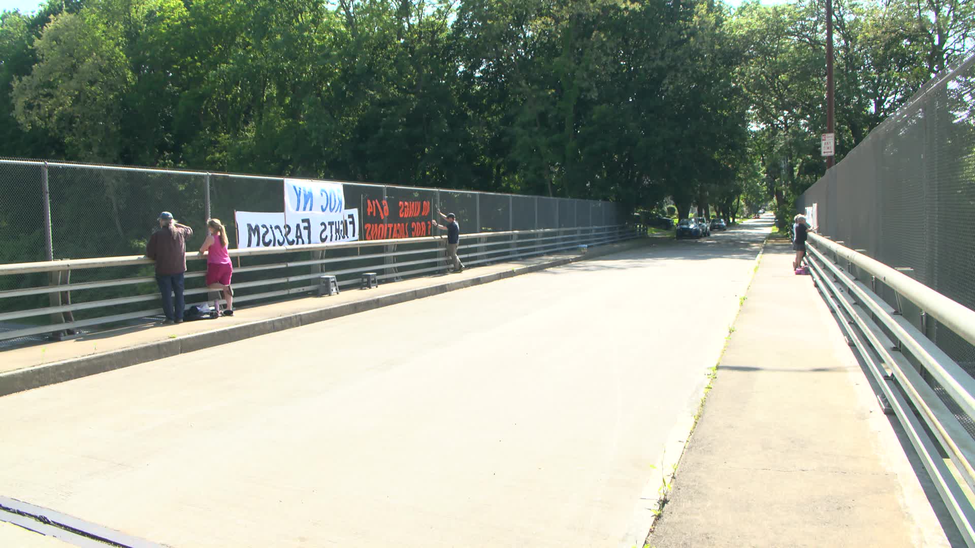 WATCH: Protest held on Tryon Bridge above 590 – RochesterFirst