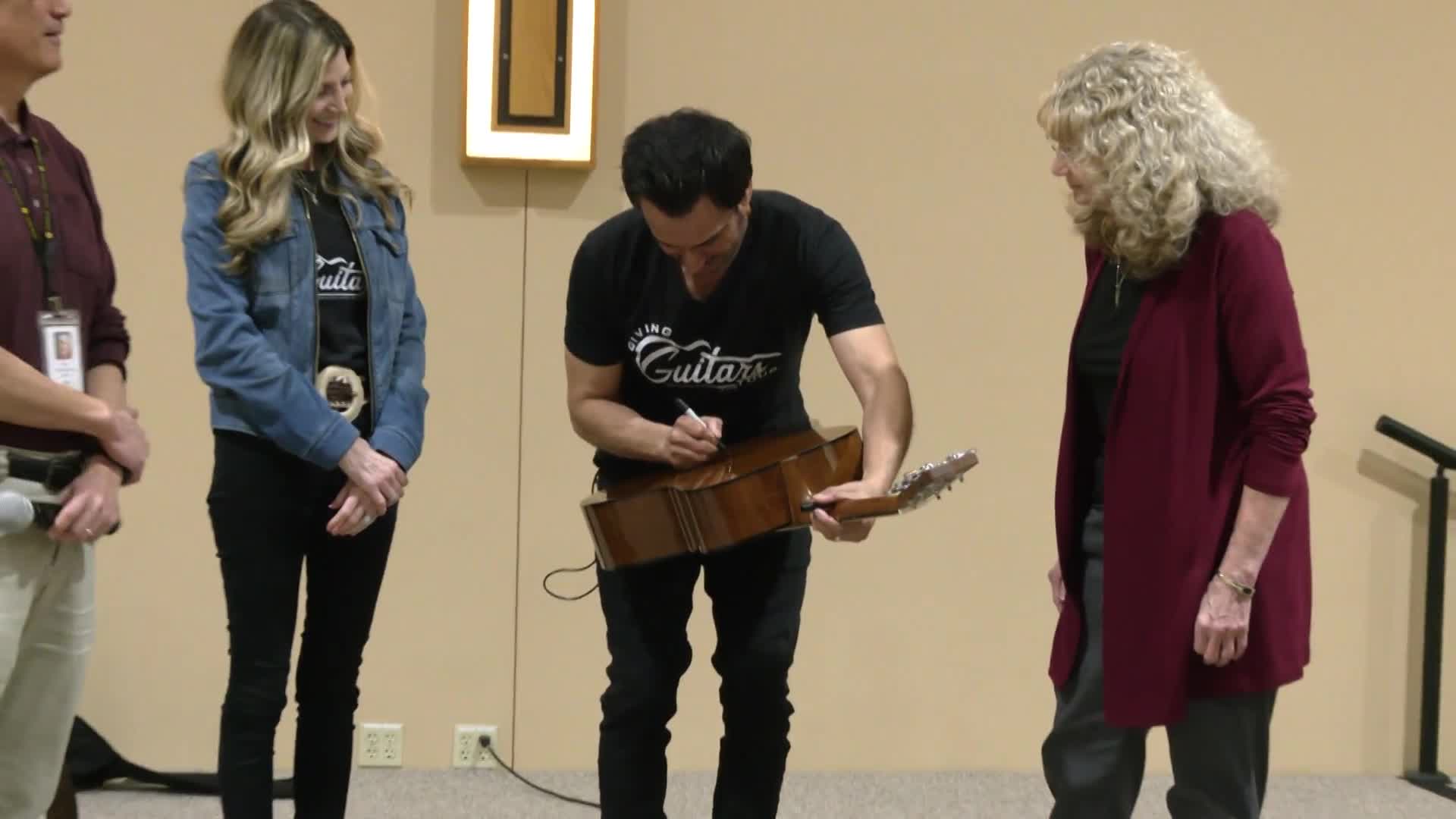 Steven Cade “Giving Guitars” tour stop at the Rockford Rescue Mission ...